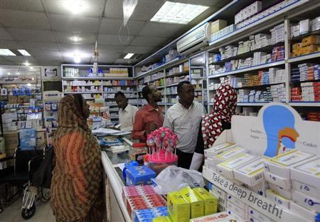 A customer buys medication at a pharmacy in Khartoum – Channels Television