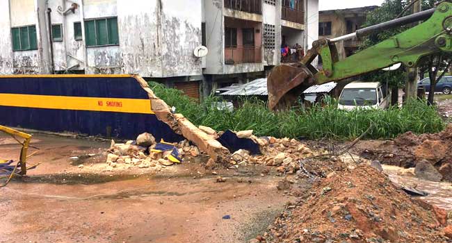 PHOTOS: FERMA Demolishes Illegal Structures Along Onitsha-Owerri ...
