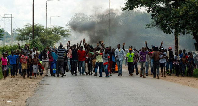 PHOTOS: Protest Rocks Zimbabwe As Government Increases Price Of Fuel ...
