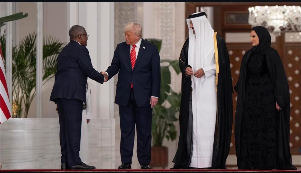 Dangote in a handshake with Trump during the dinner in Doha, Qatar ...